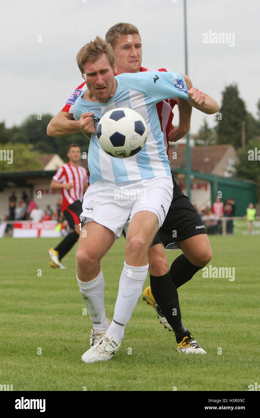 Jamie Laird of Weston shields the ball from Lewis Smith - AFC ...