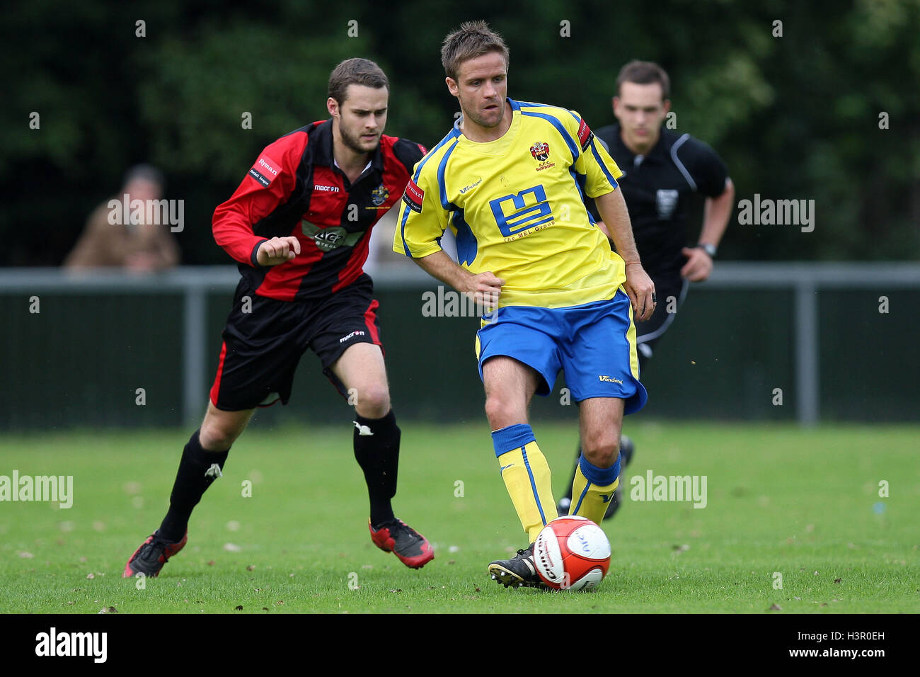 Steve Wareham of Sudbury gets to the ball ahead of Paul Clayton of ...