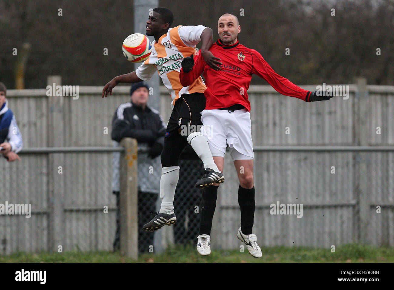 Jonathan Hunt of Hornchurch rises with Akwasi Edusei of Ashford ...