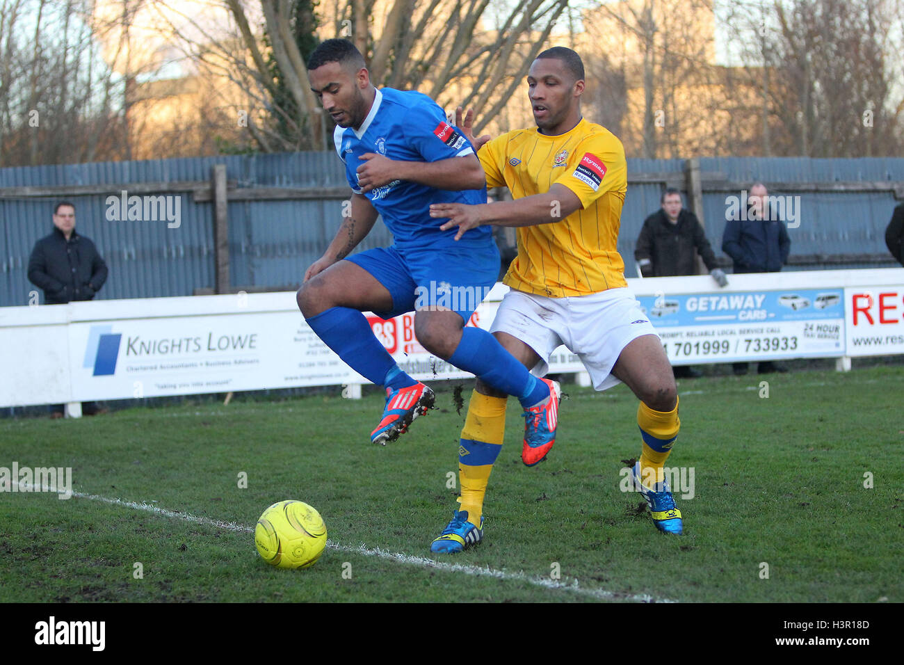 Daniel Cunningham of Bury Town tangles with Rickie Hayles of AFC ...