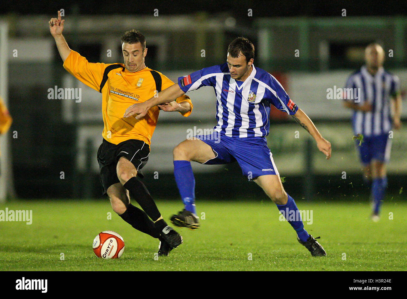 Martin Tuohy of Hornchurch tangles with Steve Harrison of East Thurrock ...