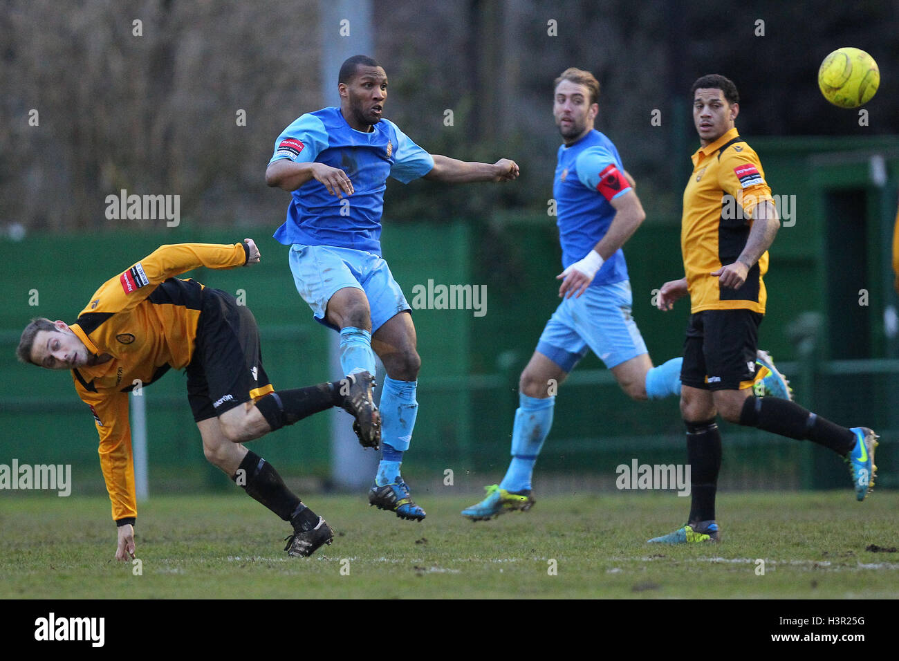 Rickie Hayles of Hornchurch clears from David Bryant of East Thurrock ...