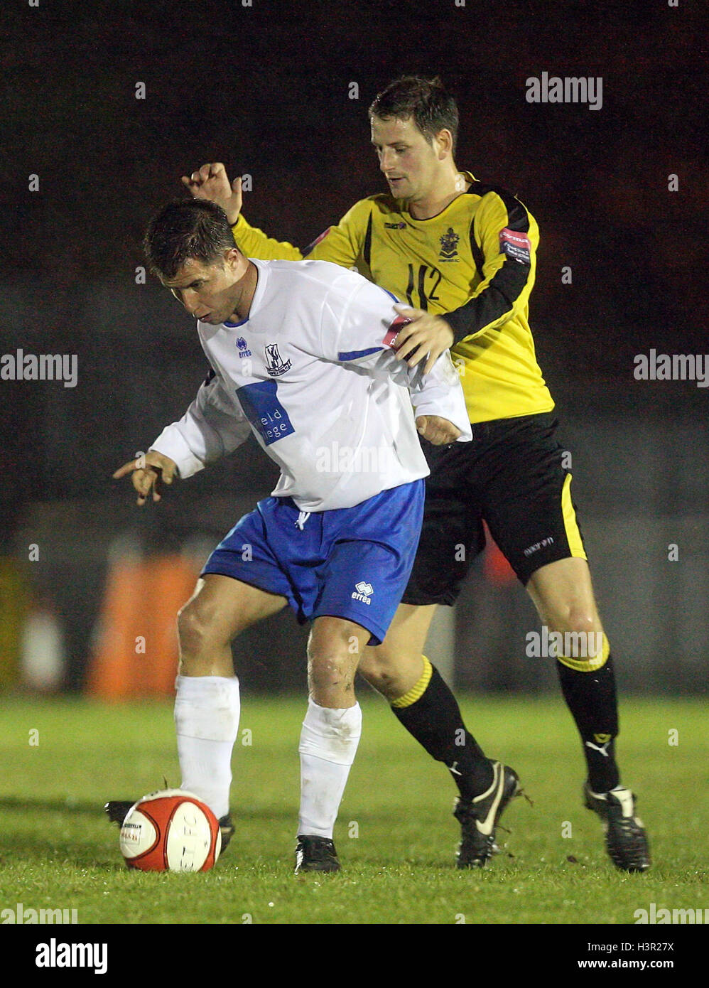 Rudi Hall of Enfield Town shields the ball from Bobby Port - Enfield ...