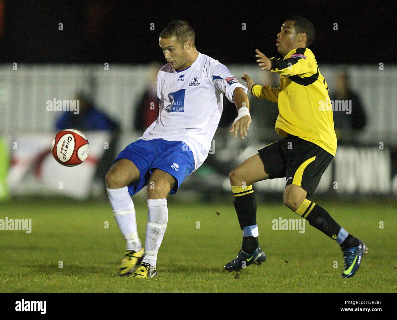 Dave Blower of Enfield clears the ball from Paul Burnett - Enfield Town ...