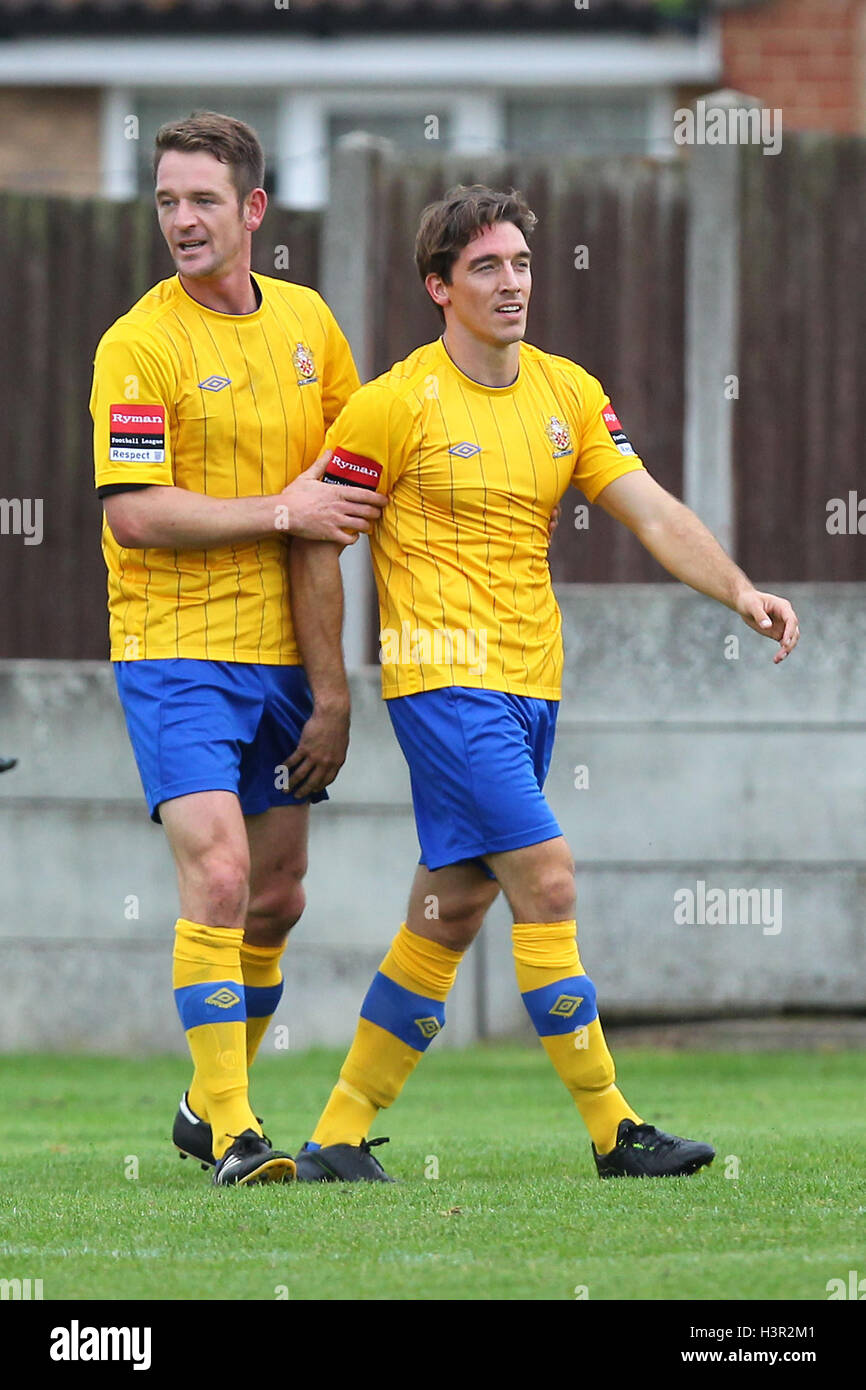 Carl Rook (L) congratulates Leigh Bremner of AFC Hornchurch on scoring ...