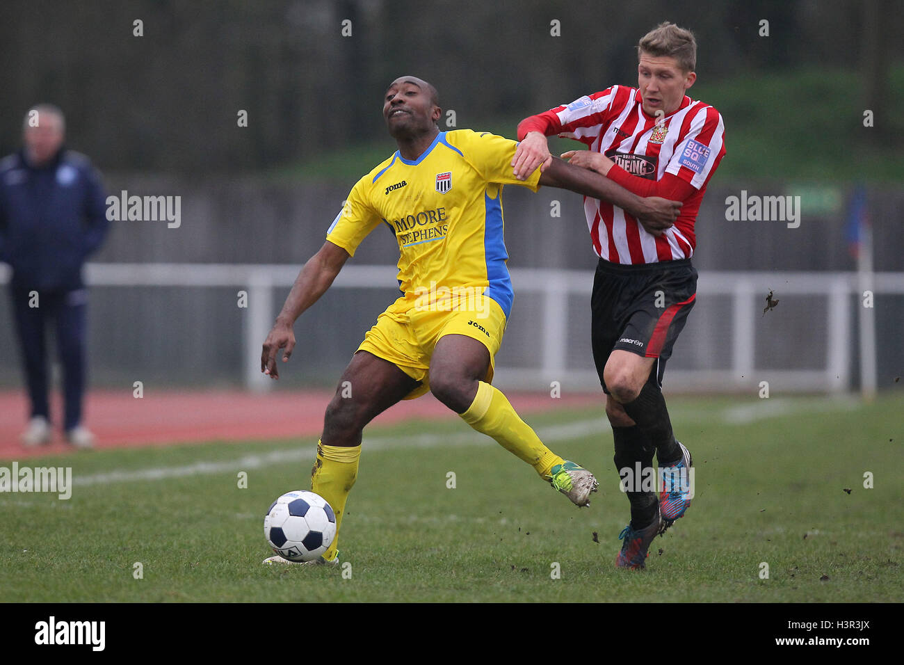 Lewis Smith of Hornchurch tangles with Aaron Brown - AFC Hornchurch vs ...