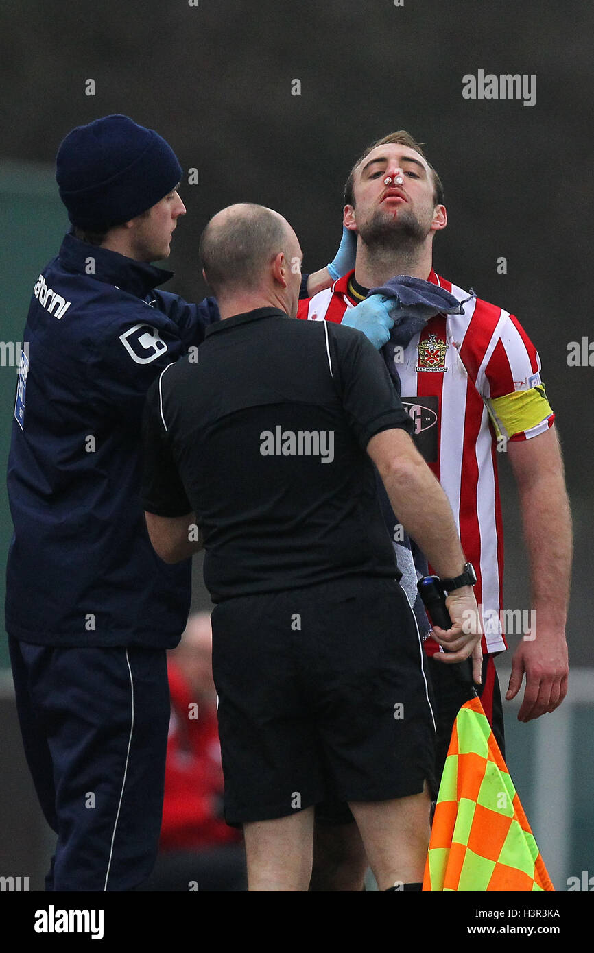 Elliot Styles receives treatment for a nose injury - AFC Hornchurch vs ...