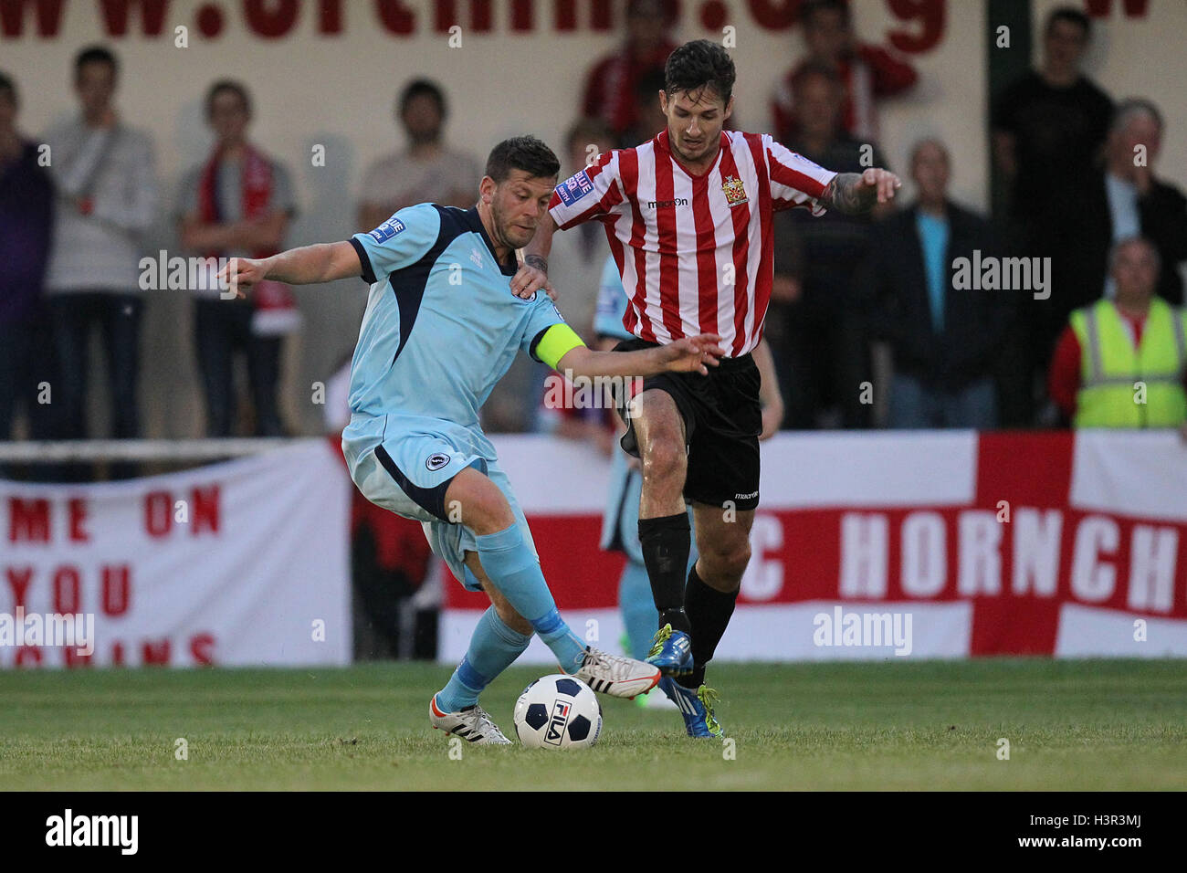 Luke Gerrard of Boreham Wood tangles with Simon Glover - AFC Hornchurch ...