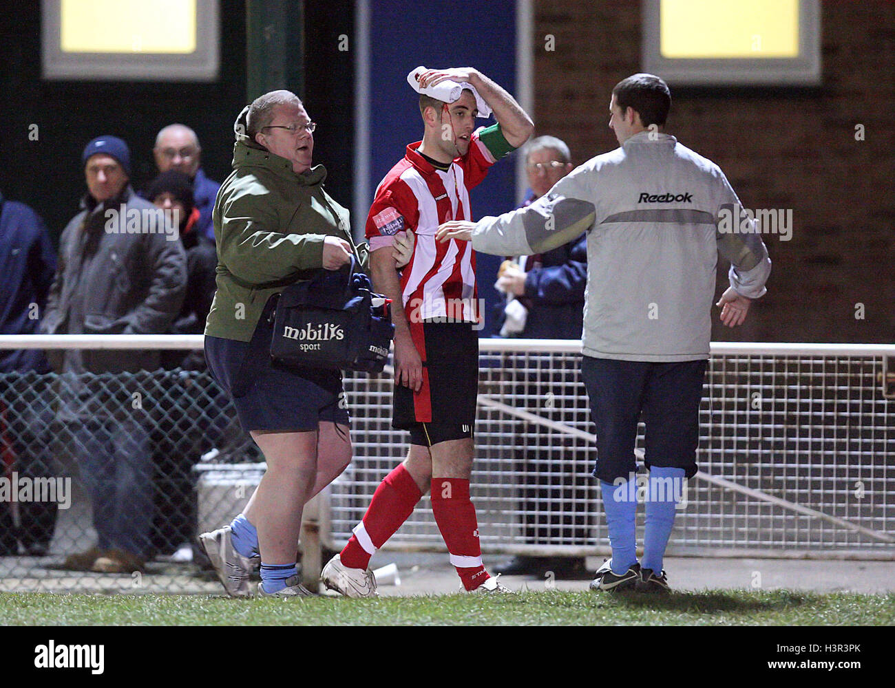 Elliot Styles of Hornchurch leaves the field with blood pouring from a ...