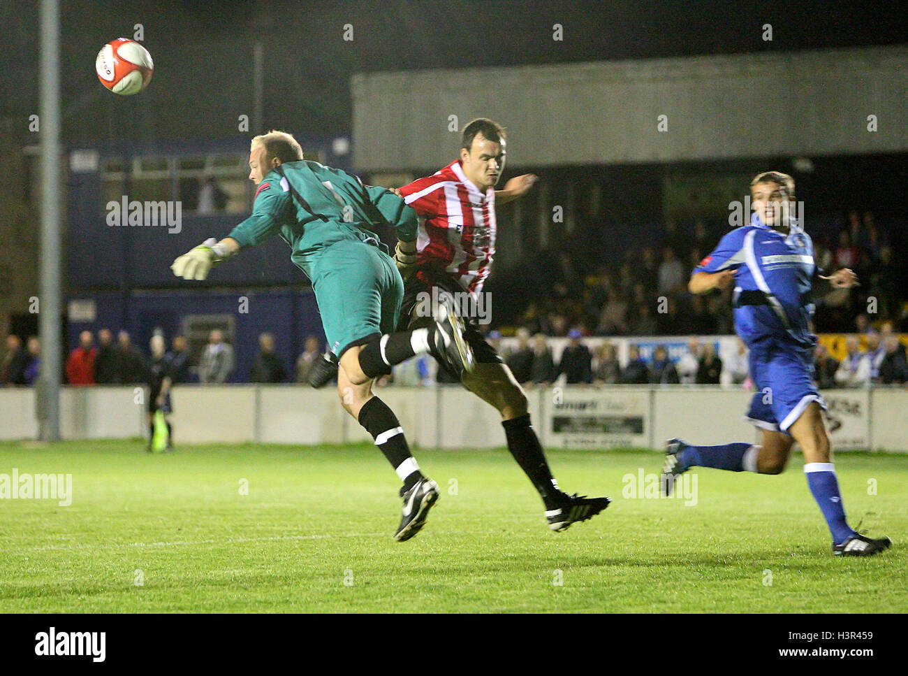 Martin Tuohy of Hornchurch challenges Lowestoft goalkeeper Andy ...