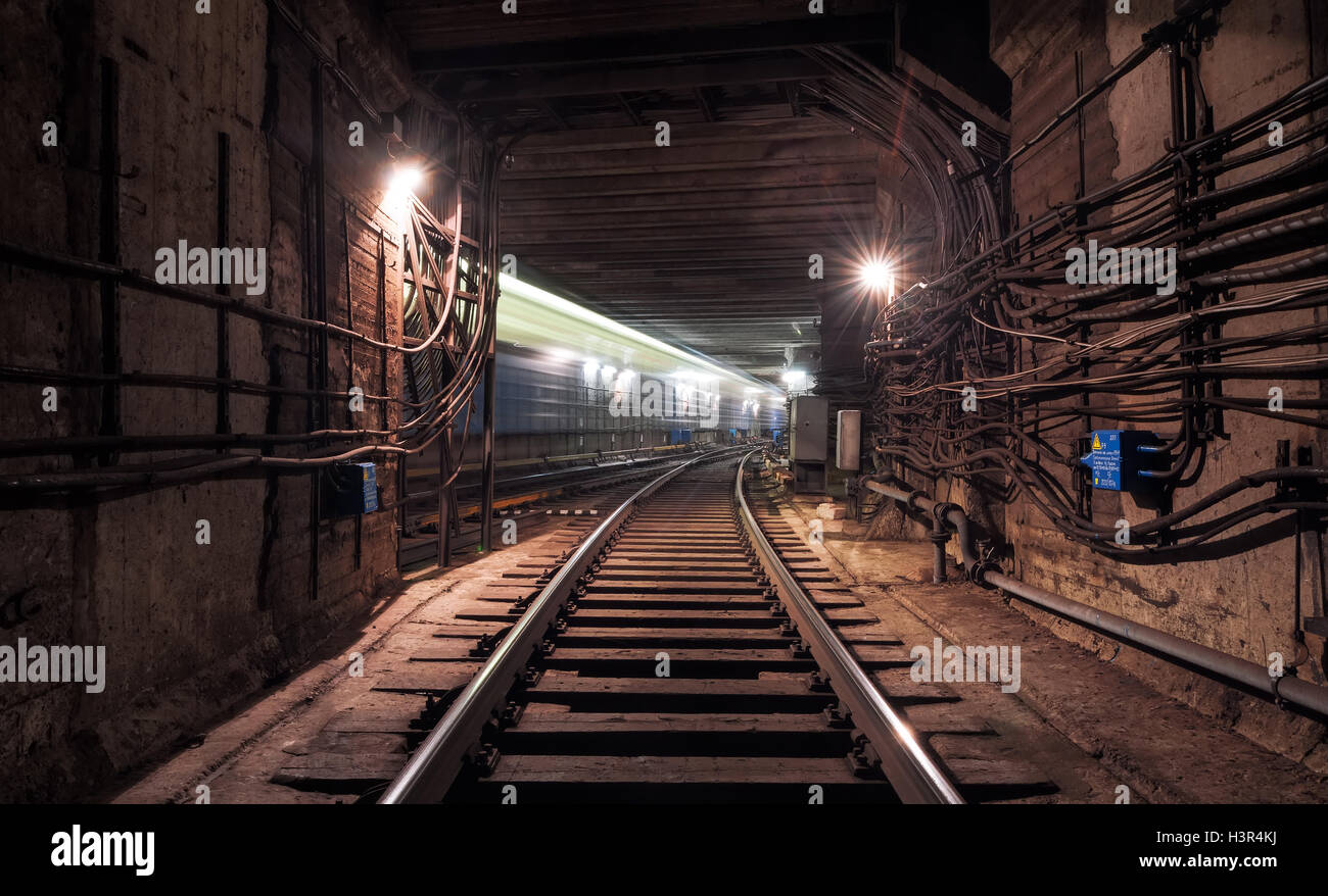 Passing train in the subway tunnel Stock Photo - Alamy