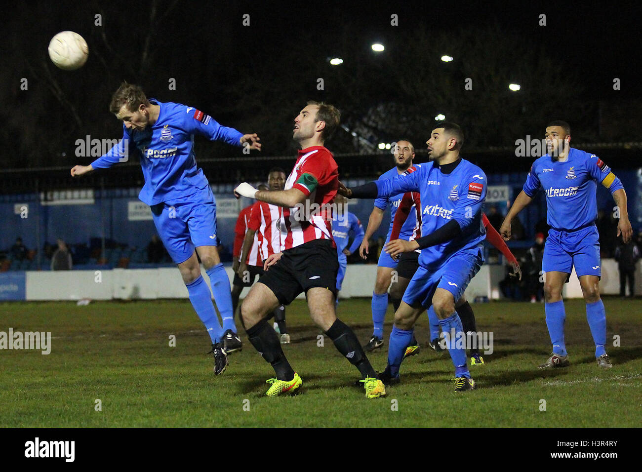 George Winn of Redbridge heads clear from Elliot Styles of Hornchurch ...