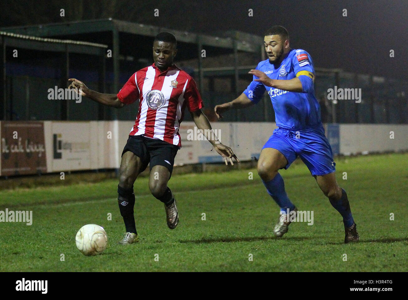 Nnamdi Nwachuku of Hornchurch tussles with Liam Thomas of Redbridge ...