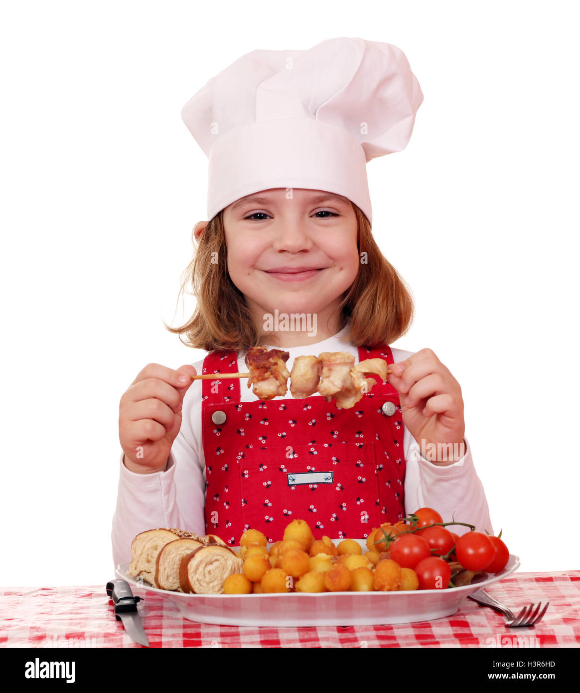 little girl cook eat grilled chicken meat Stock Photo - Alamy