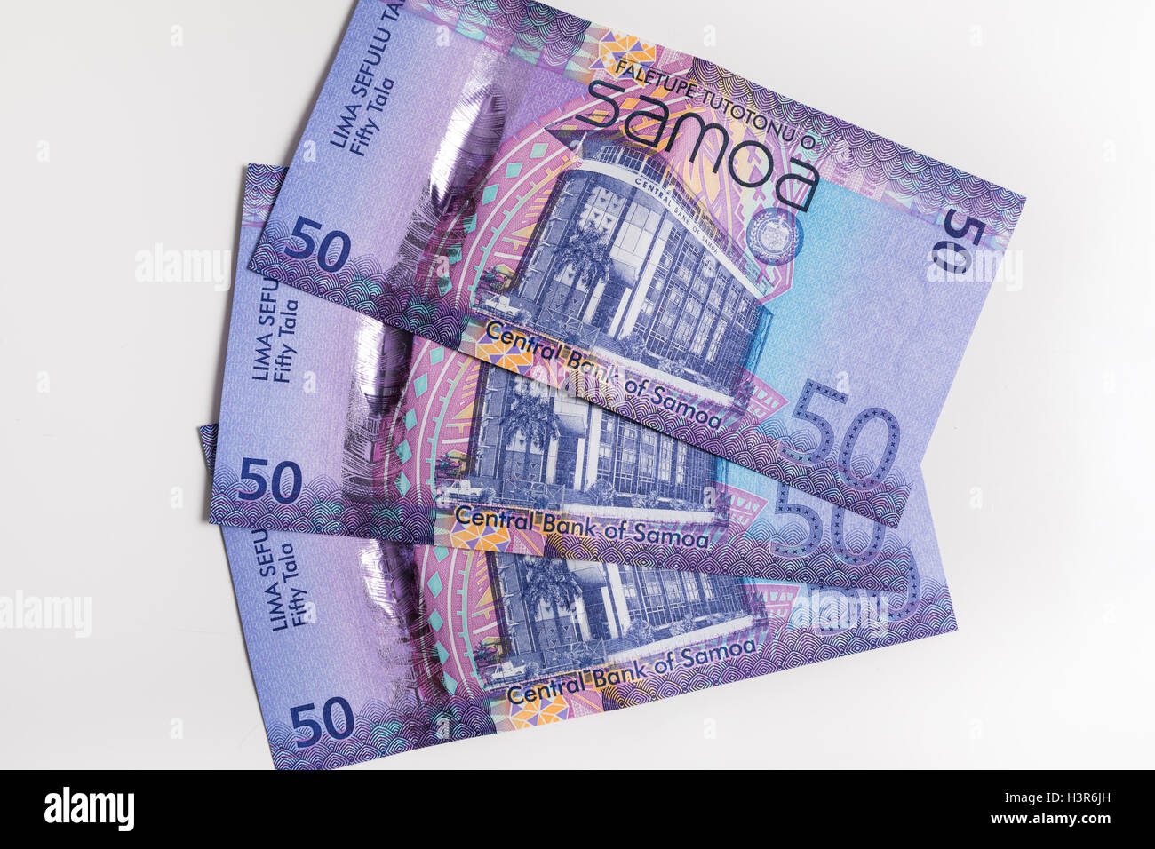 Samoa Tala bank notes isolated on white Stock Photo - Alamy