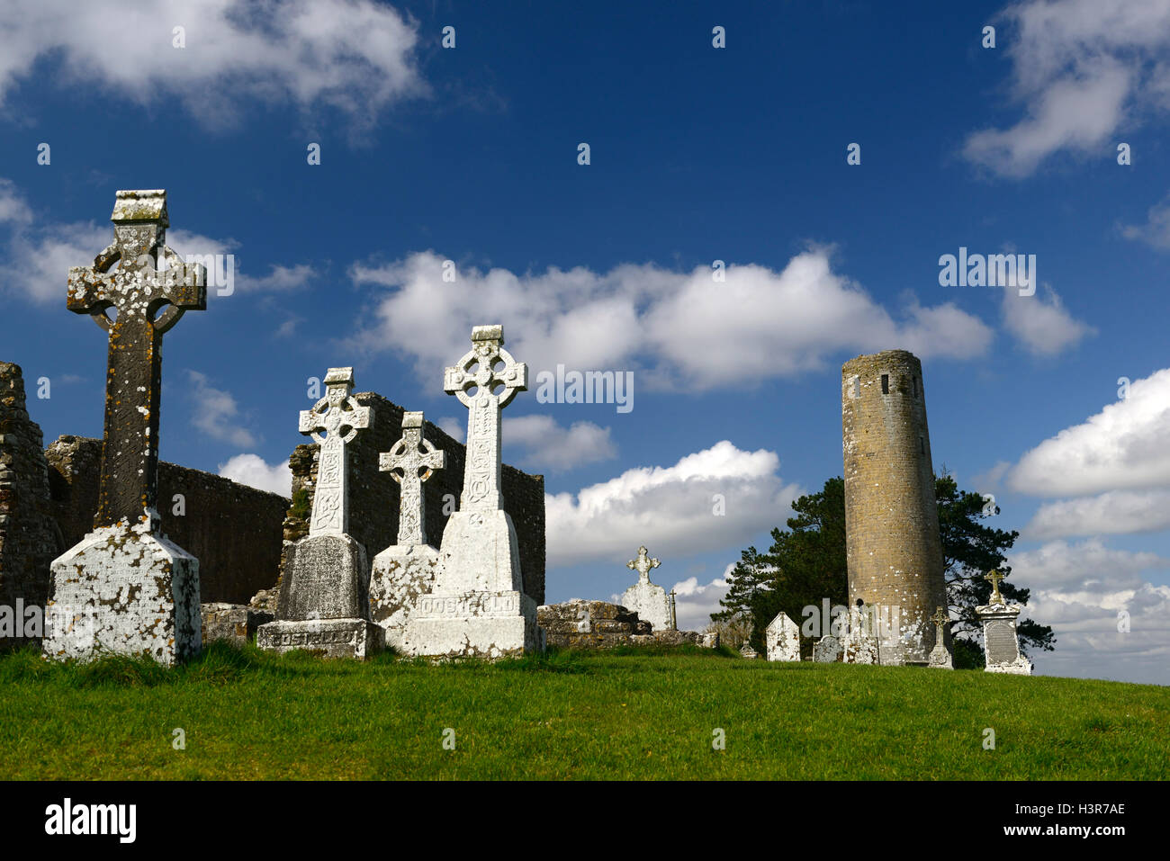 Stone round tower high cross crosses Clonmacnoise Monastery monastic ...