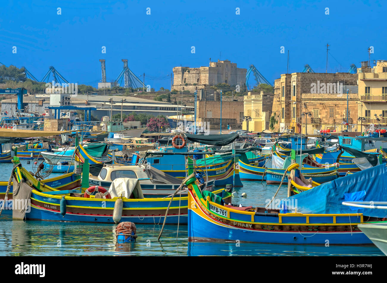 Traditional Maltese fishing boats in the largest fishing village of the ...