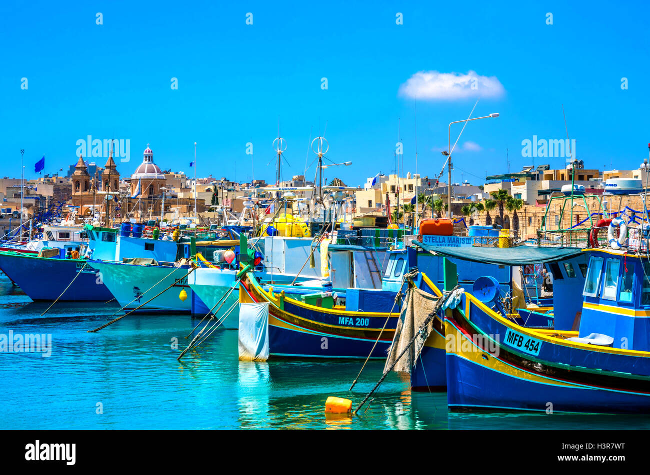 Traditional Maltese fishing boats in the largest fishing village of the ...
