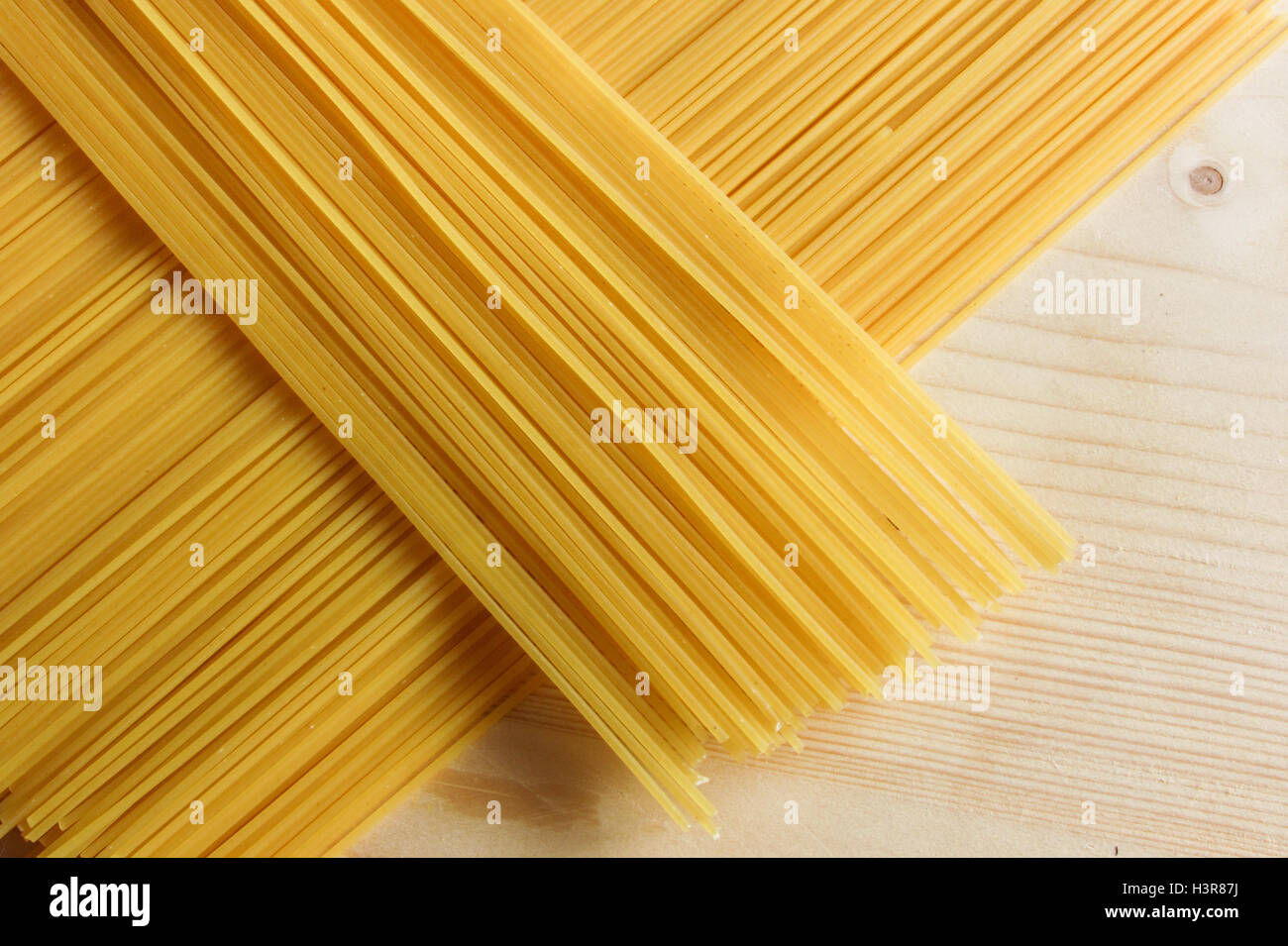 uncooked Italian spaghetti as background Stock Photo - Alamy