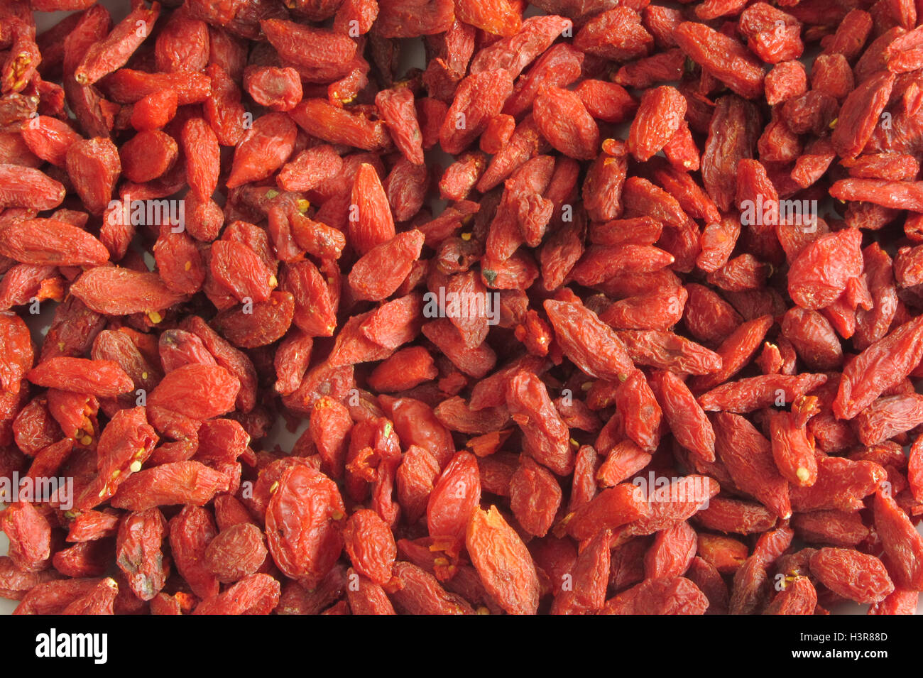 goji beans texture Stock Photo - Alamy