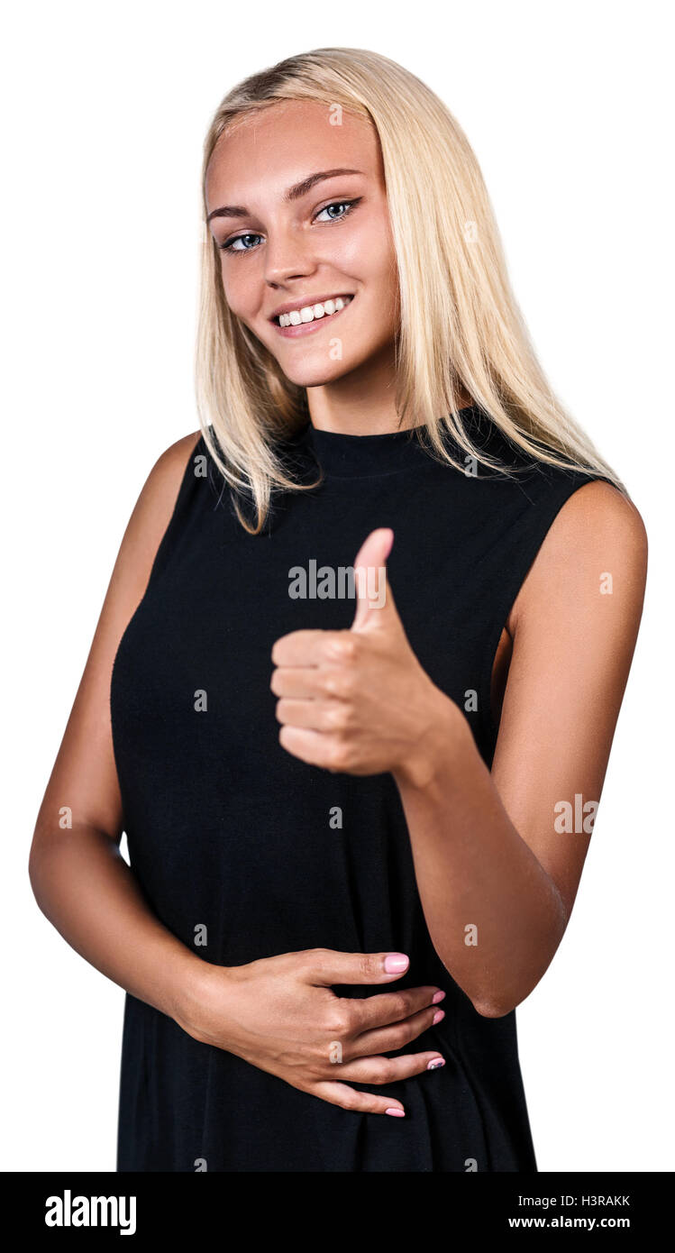 Young woman with thumbs up gesture Stock Photo - Alamy