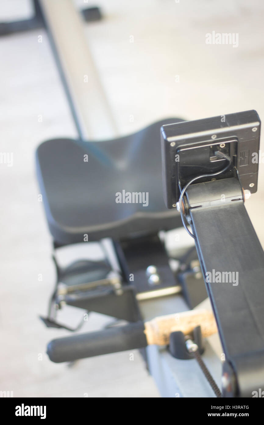 Gym exercise rowing machine static rower in gymnasium fitness studio ...