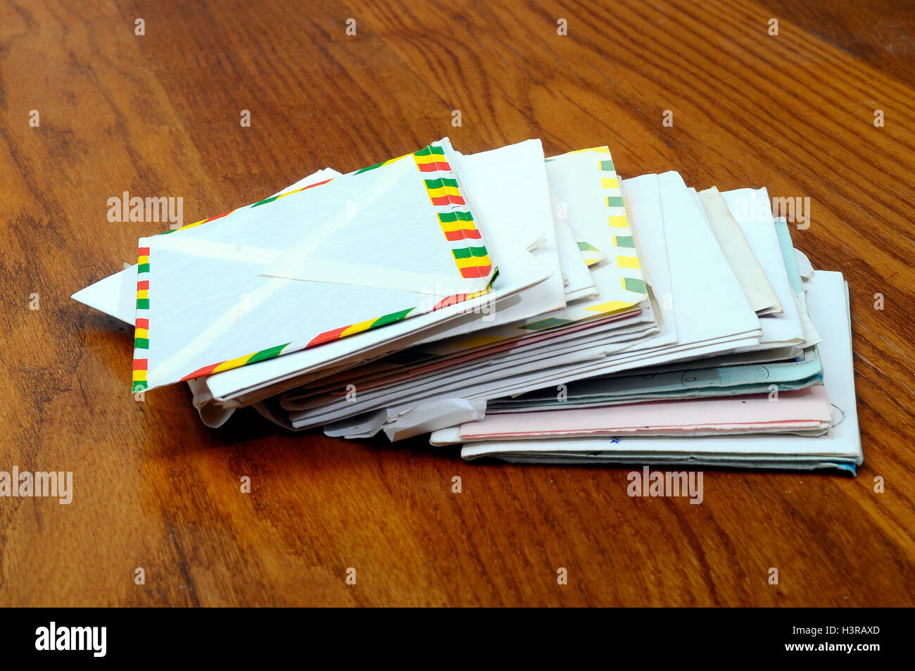 Pile of old mails letters and envelopes on wooden table Stock Photo - Alamy