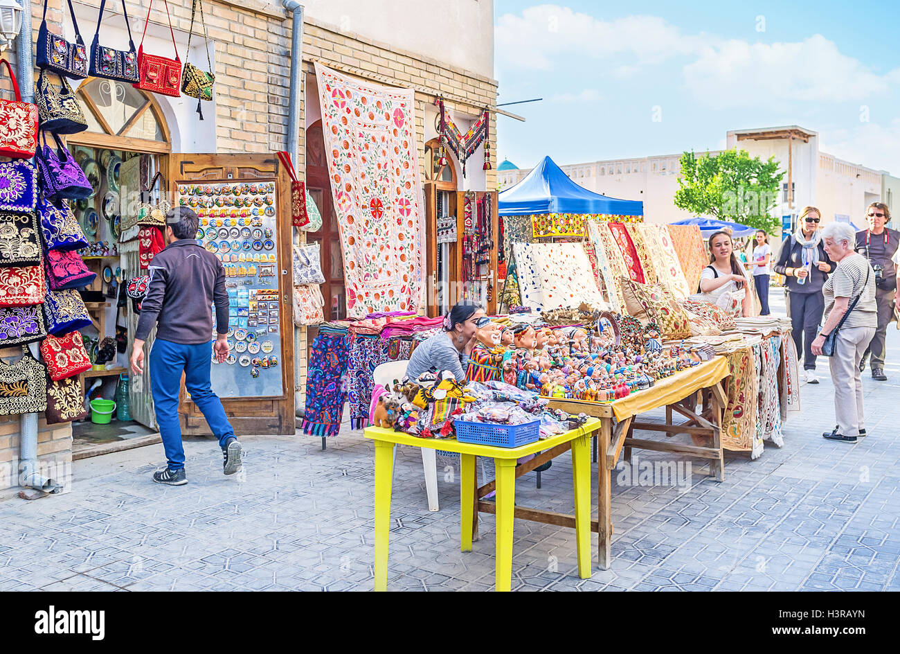 The tourist shop offers many different souvenirs in Bukhara Stock Photo ...