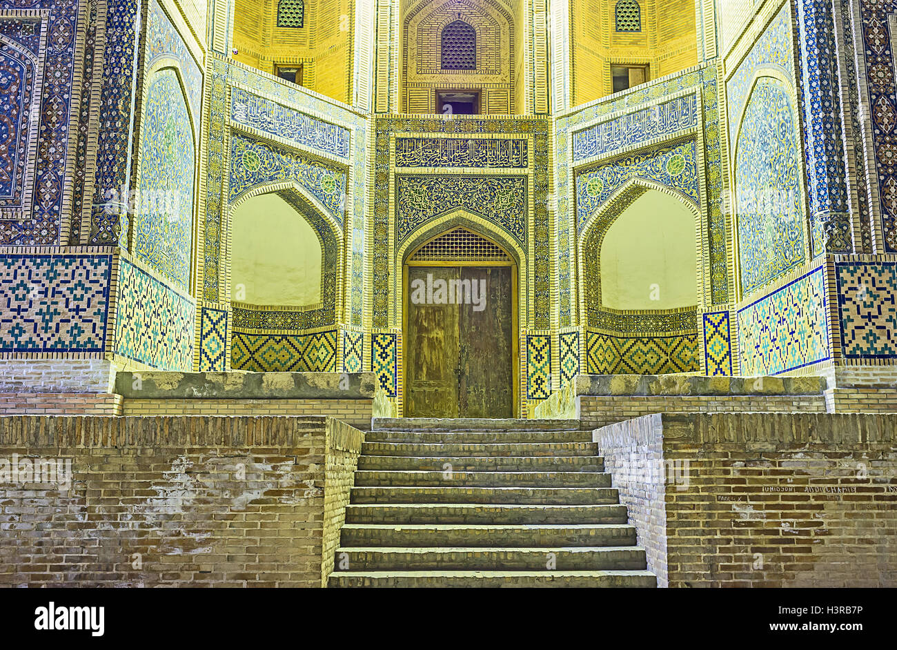 The stairs leads to the Mir-i Arab Madrassa entrance, richly decorated ...