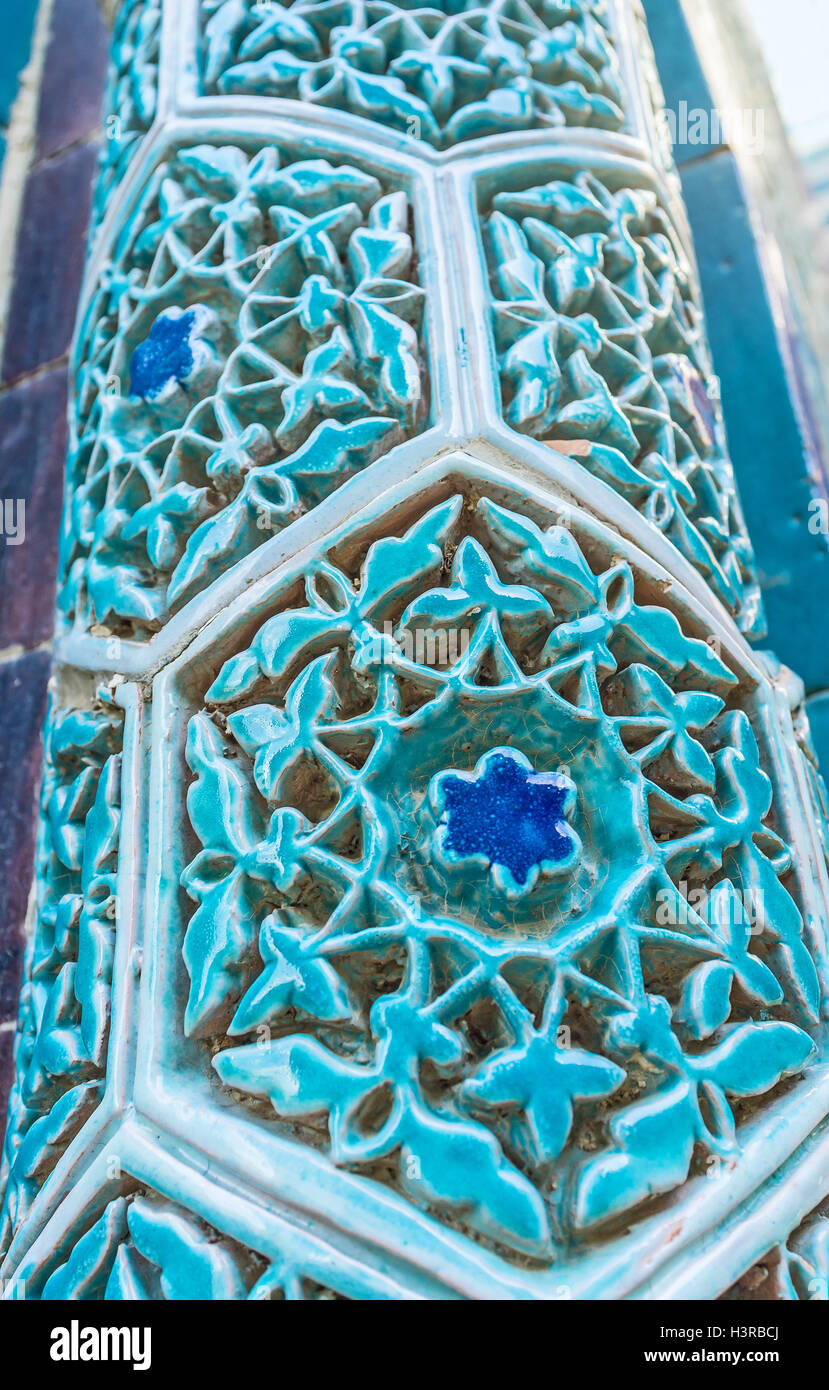 The round column is covered with the specially made tiles with the ...