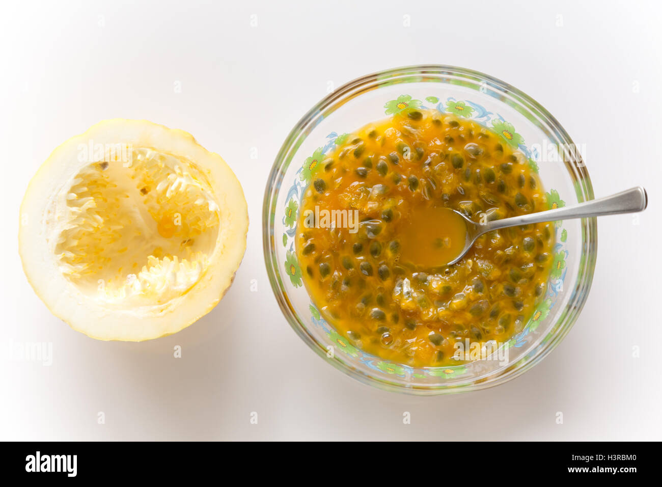 Split sour passion fruit empty inside and passion fruit pulp, juicy ...