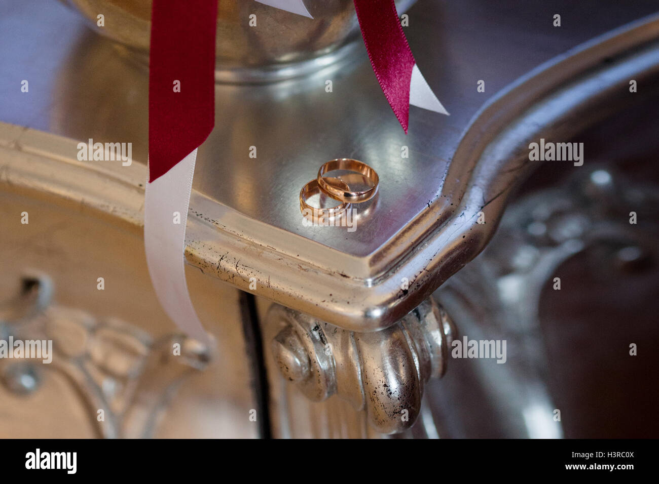 gold wedding rings on the table, close up Stock Photo - Alamy