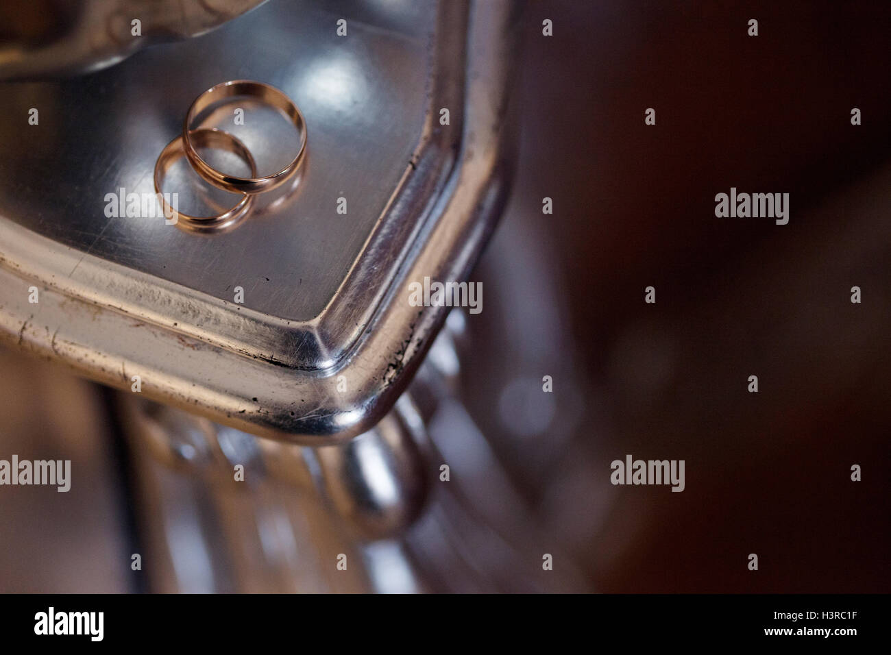 gold wedding rings on the table, close up Stock Photo - Alamy