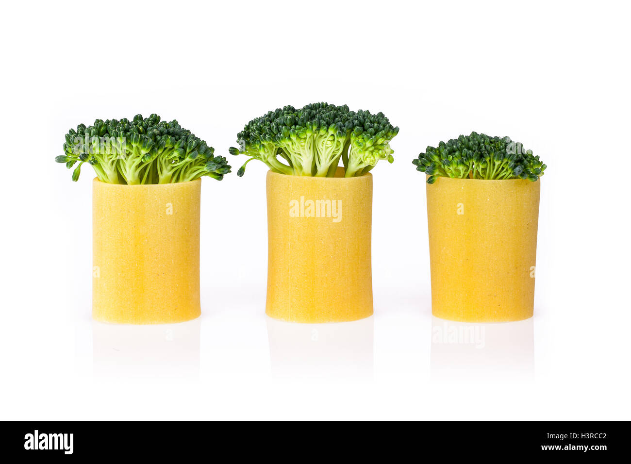Green broccoli on orange Cut Out Stock Images & Pictures - Alamy