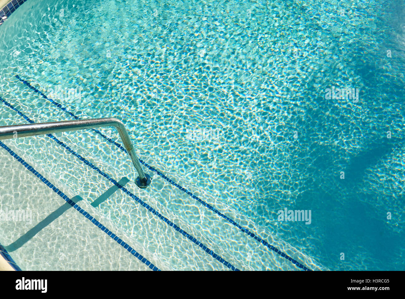 Blue swimming pool rippled water detail Stock Photo - Alamy