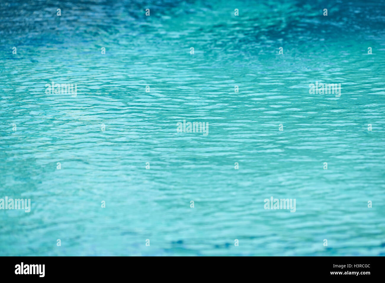 Blue swimming pool rippled water detail Stock Photo - Alamy
