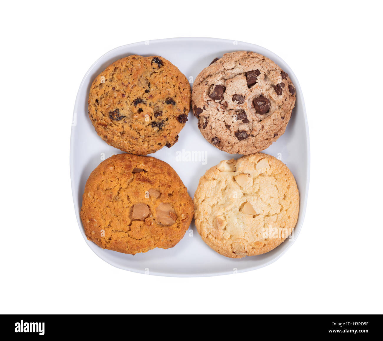 Variety of cookies in ceramic plate isolated on white Stock Photo - Alamy