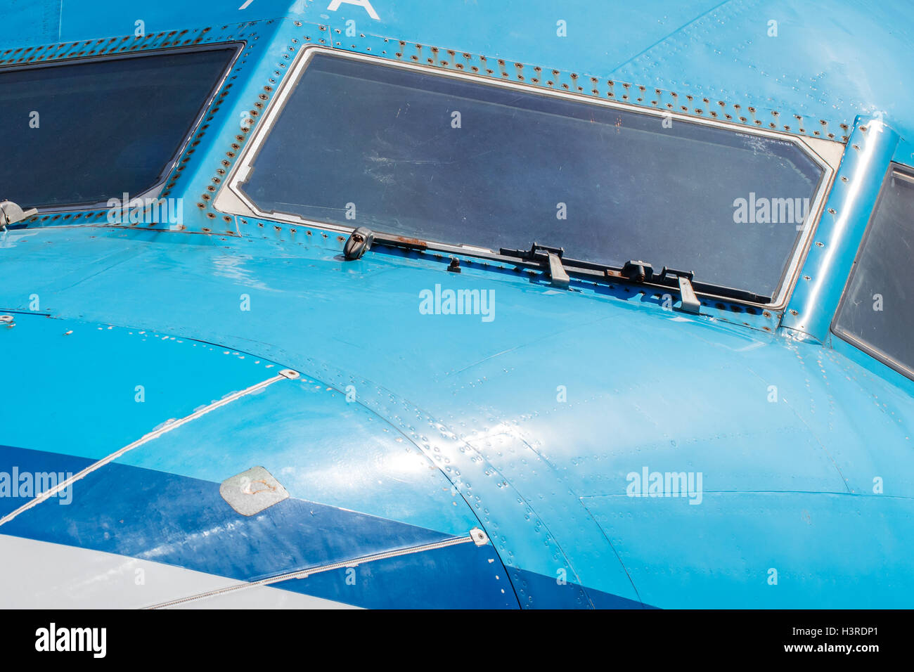 Cockpit close up of blue jet airplane Stock Photo - Alamy