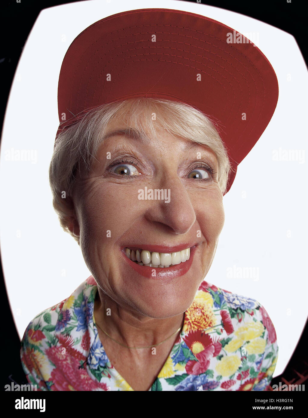 older woman, red sign cap, smiling portrait mb 71 A7 Stock Photo - Alamy
