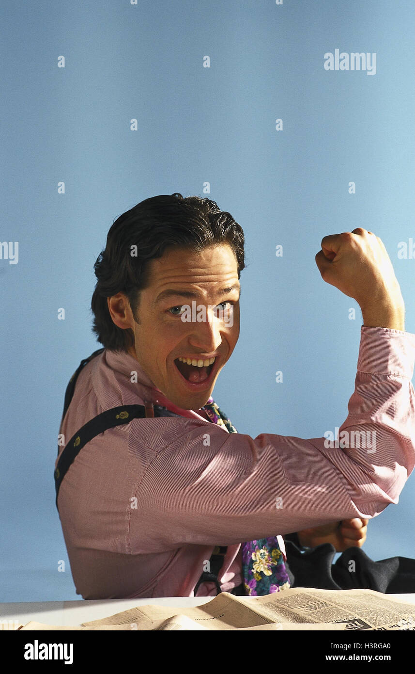Man, young, sit, gesture, cheering, success, joy, portrait, newspaper ...