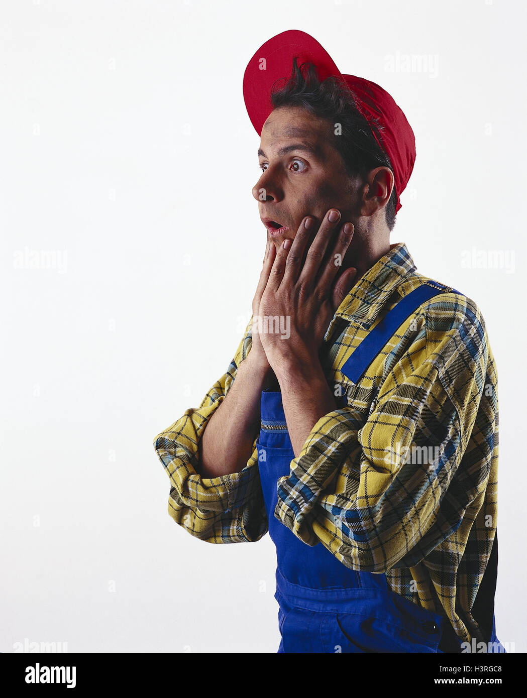 Man, sign cap, overalls, gesture, surprises, startled, studio mb 138 A9 ...