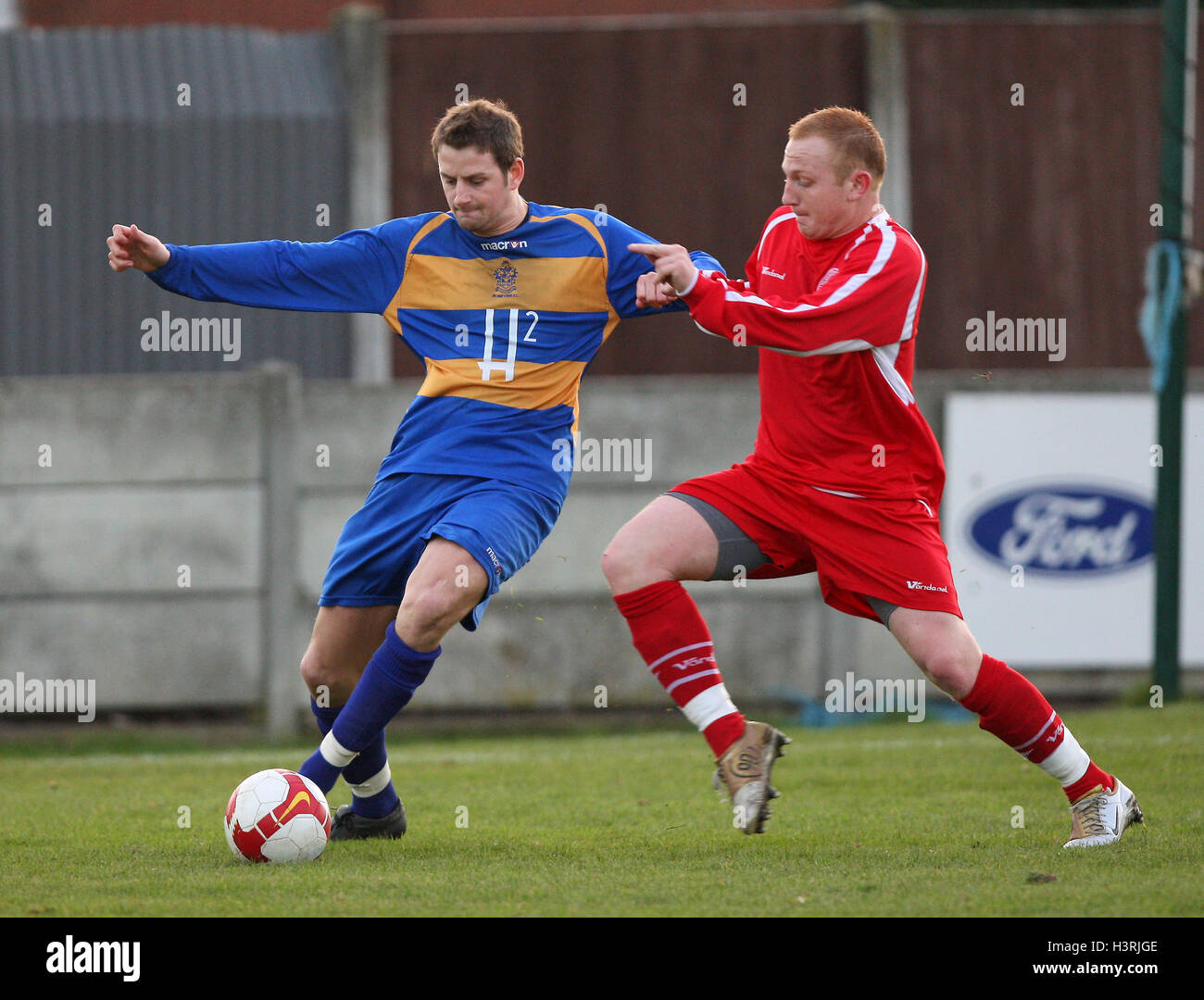 Bobby Port of Romford clears from Chris Lewis of Barkingside - Romford ...