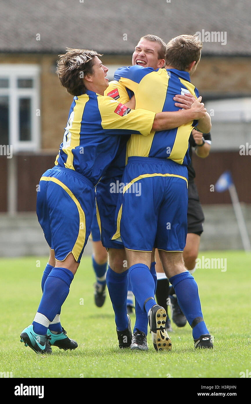 Romford celebrate their first goal scored by Richard Oxby (C) - Romford ...