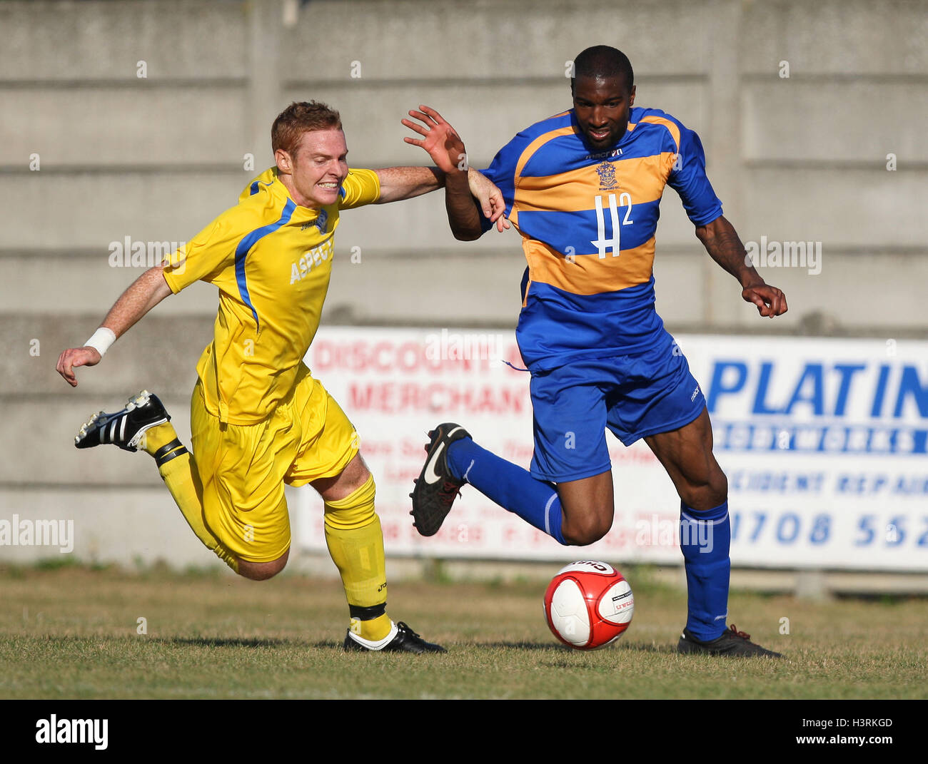 Sean Clarke of Romford rounds Liam Hopkins of Concord - Romford vs ...
