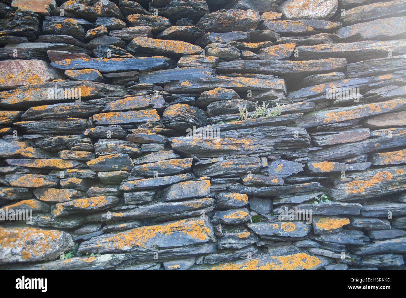 Color image of a wall made of stones Stock Photo - Alamy