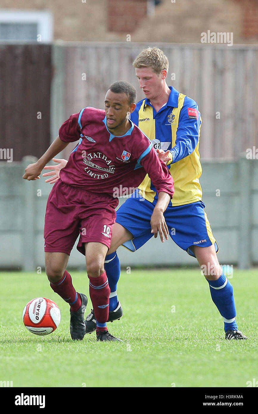 Jermaine Hall of Crawley Green shields the ball from Andy Wands ...