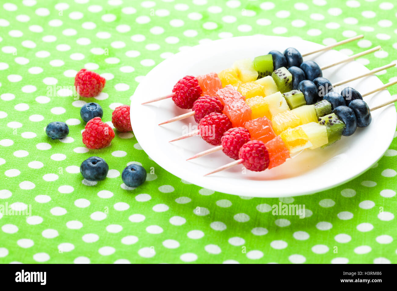 Fresh summer fruits on sticks Stock Photo - Alamy
