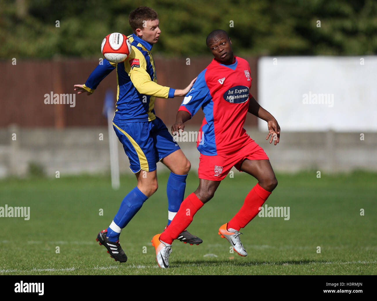 Paul Kavanagh (L) of Romford tangles with Nathan Collier of Hampton ...