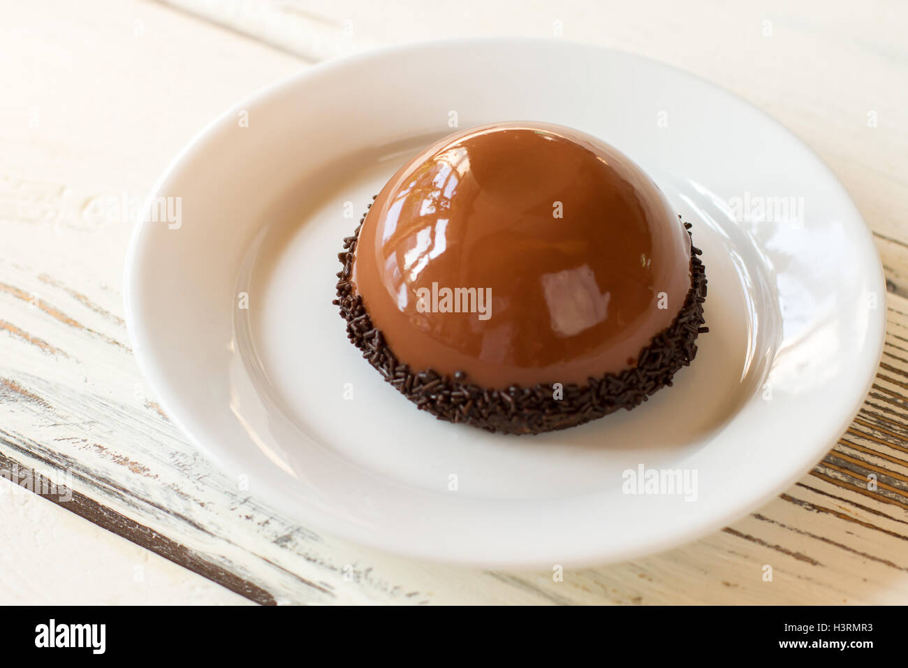 Brown half sphere candy Stock Photo - Alamy