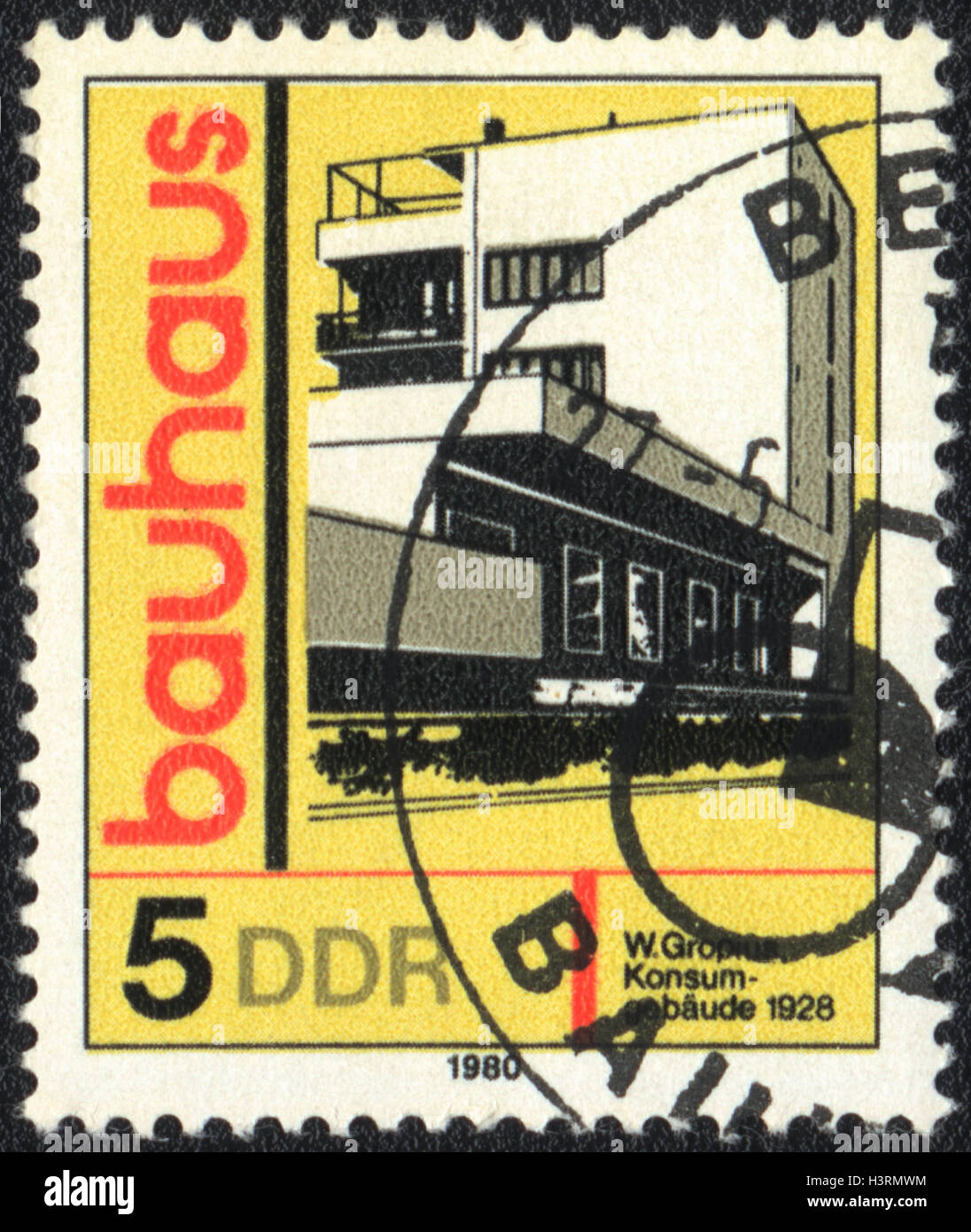 A postage stamp printed in DDR Germany shows Consumption building ...